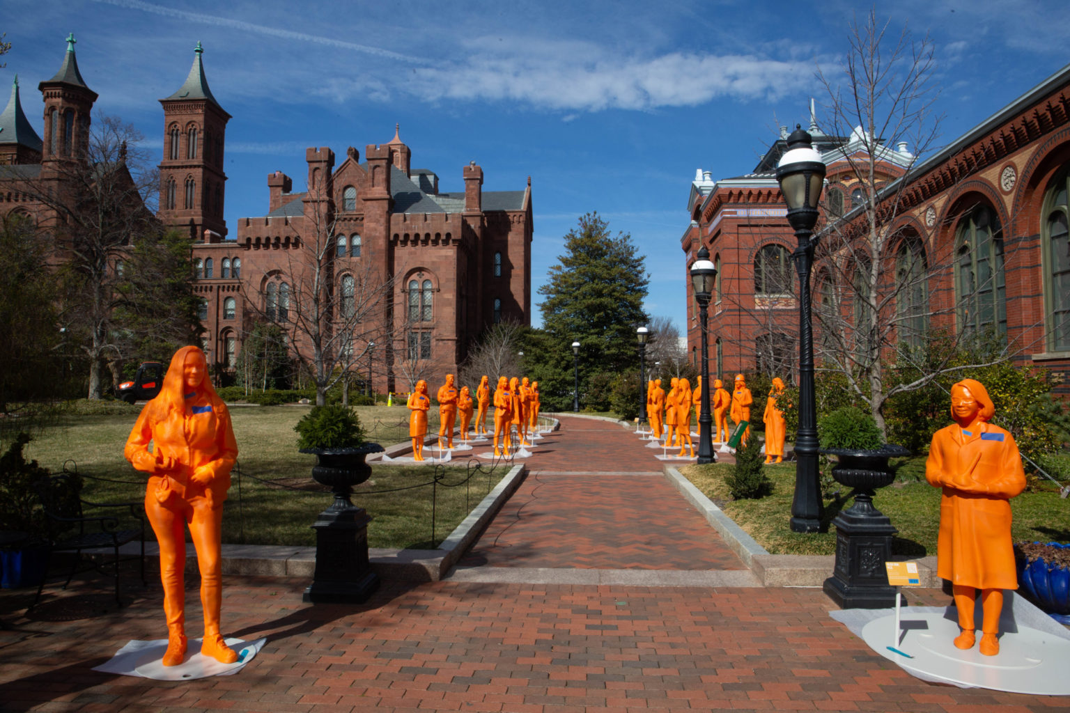 Photos: 120 Orange Statues Have Taken Over the Smithsonian Grounds ...