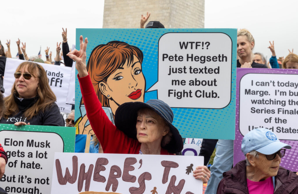 PHOTOS: Check Out These Signs at the “Hands Off!” Protest in DC ...